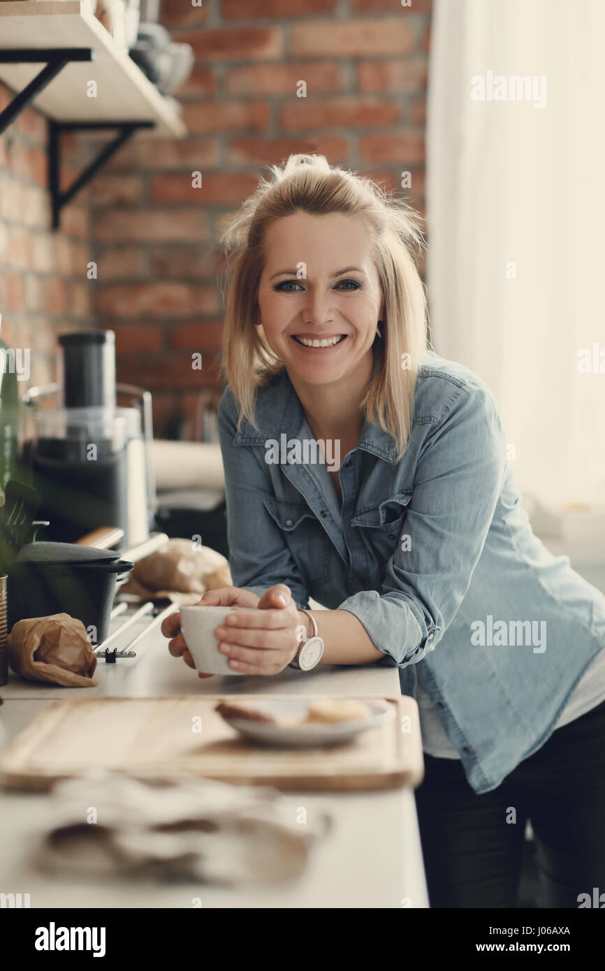 Woman at home Stock Photo - Alamy