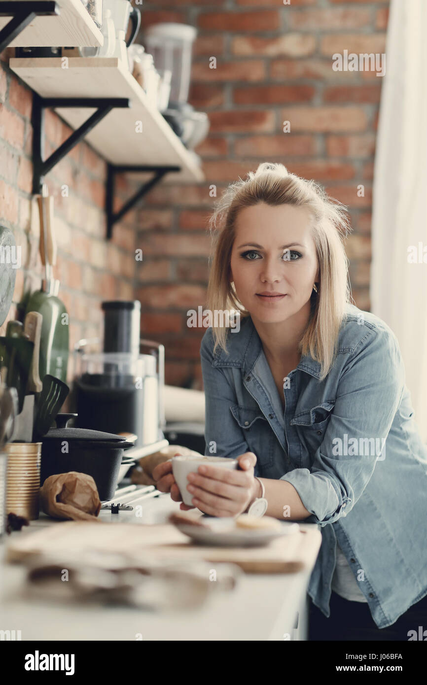 Woman at home Stock Photo - Alamy