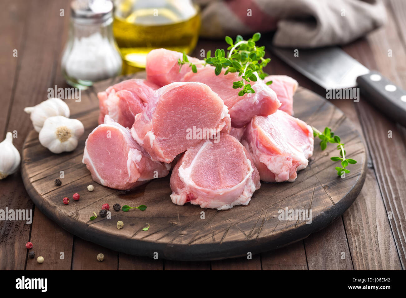 Raw meat, fillet, tenderloin on wooden background Stock Photo - Alamy