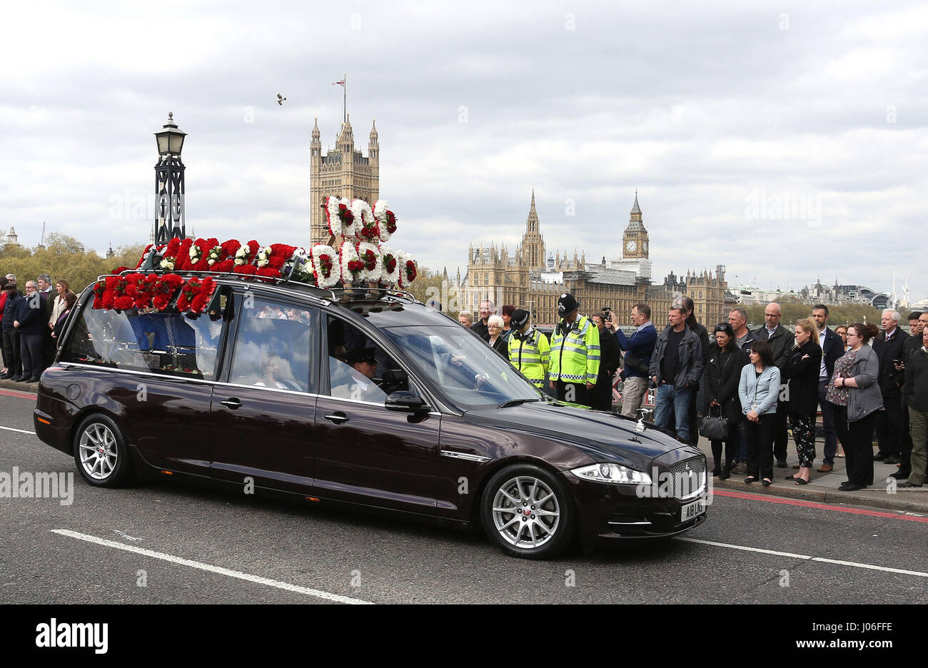 The coffin of Pc Keith Palmer crosses Lambeth Bridge with the Houses of ...