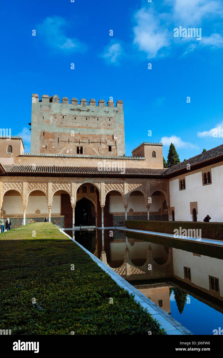 Angled view of the Arrayanes Courtyard and the Comares Tower of the ...