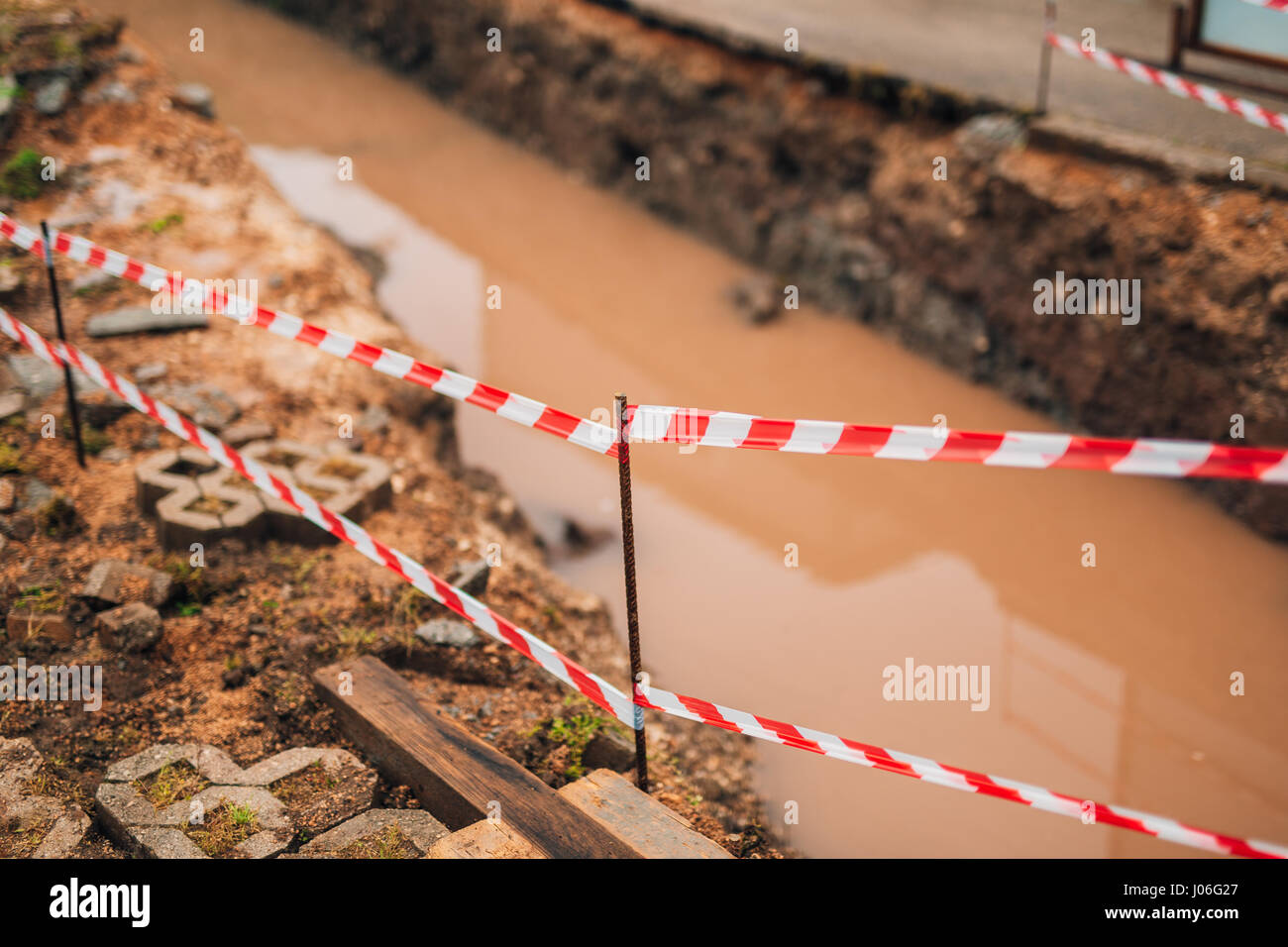Fencing tape at the construction site. Building construction Stock ...