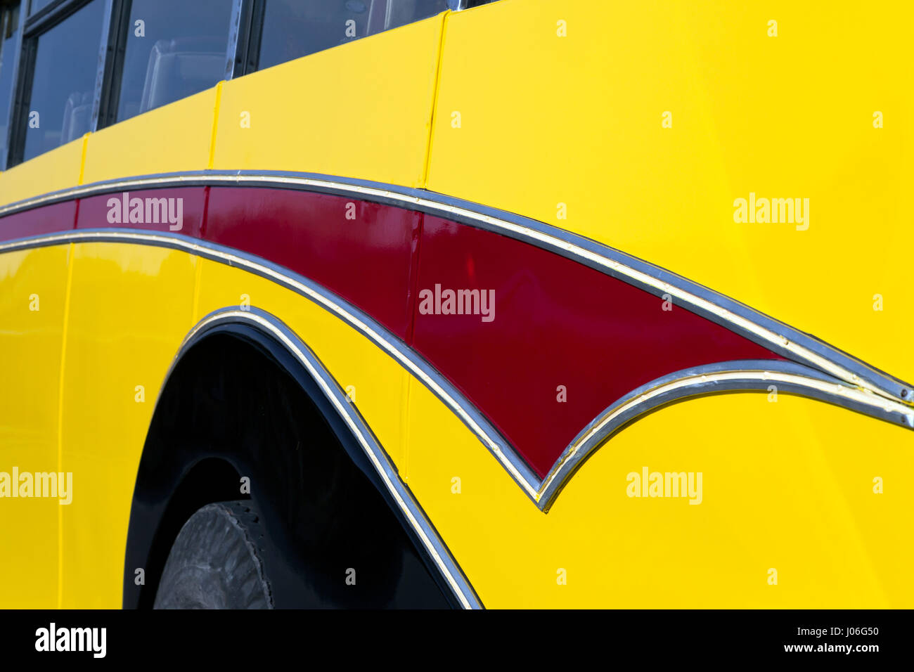 side of old bus with racing stripe Stock Photo - Alamy