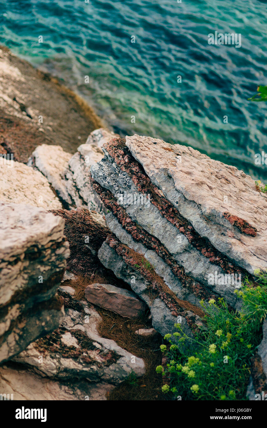Rocks on the sea in Montenegro. Rocky coast. Wild beach. Dangerous ...