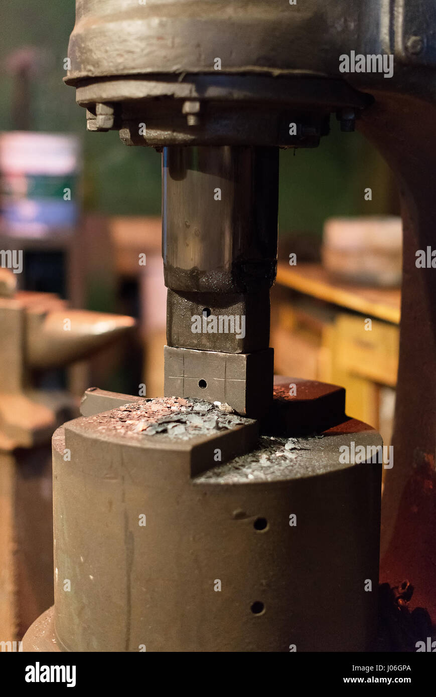 Industrial electric press in blacksmith's house Stock Photo - Alamy