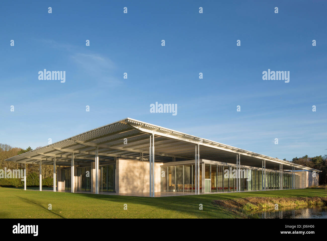 Corner elevation with roof overhang and steel colonnade. Museum ...