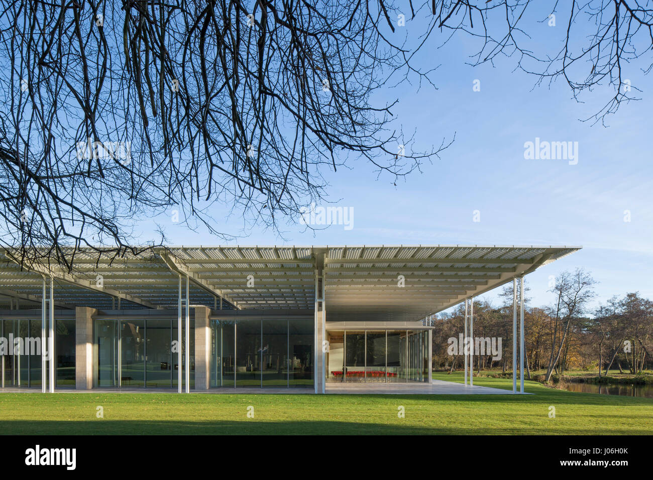 Front elevation with roof overhang and steel colonnade. Museum ...