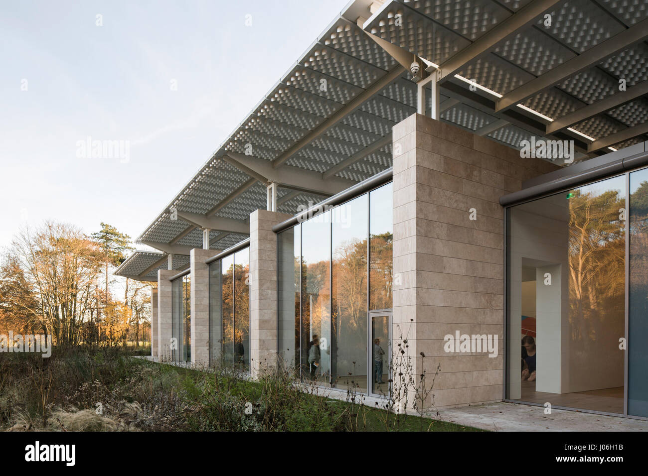 Detailed oblique elevation with roof overhang, steel colonnade and ...