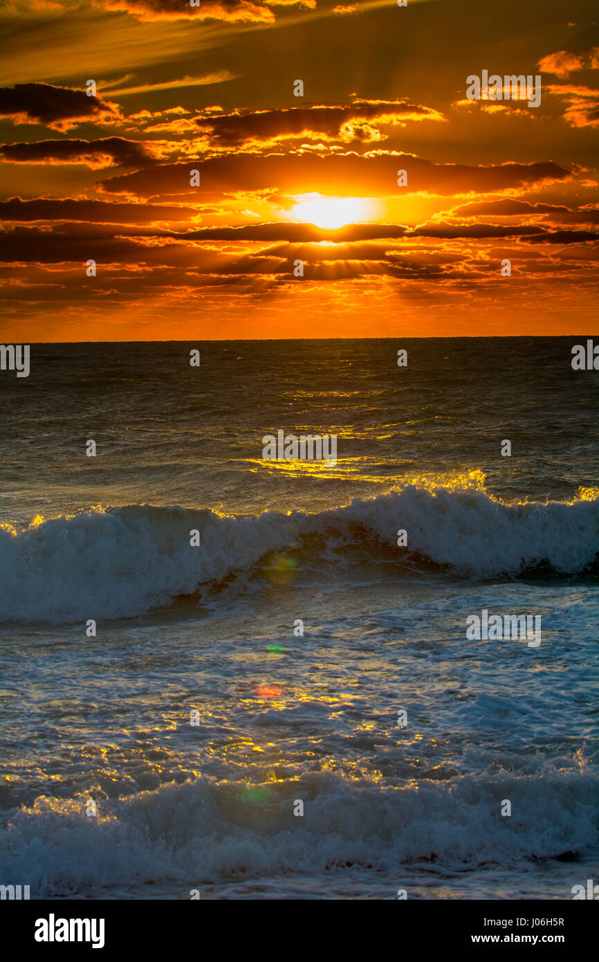 sunset on the water Stock Photo - Alamy
