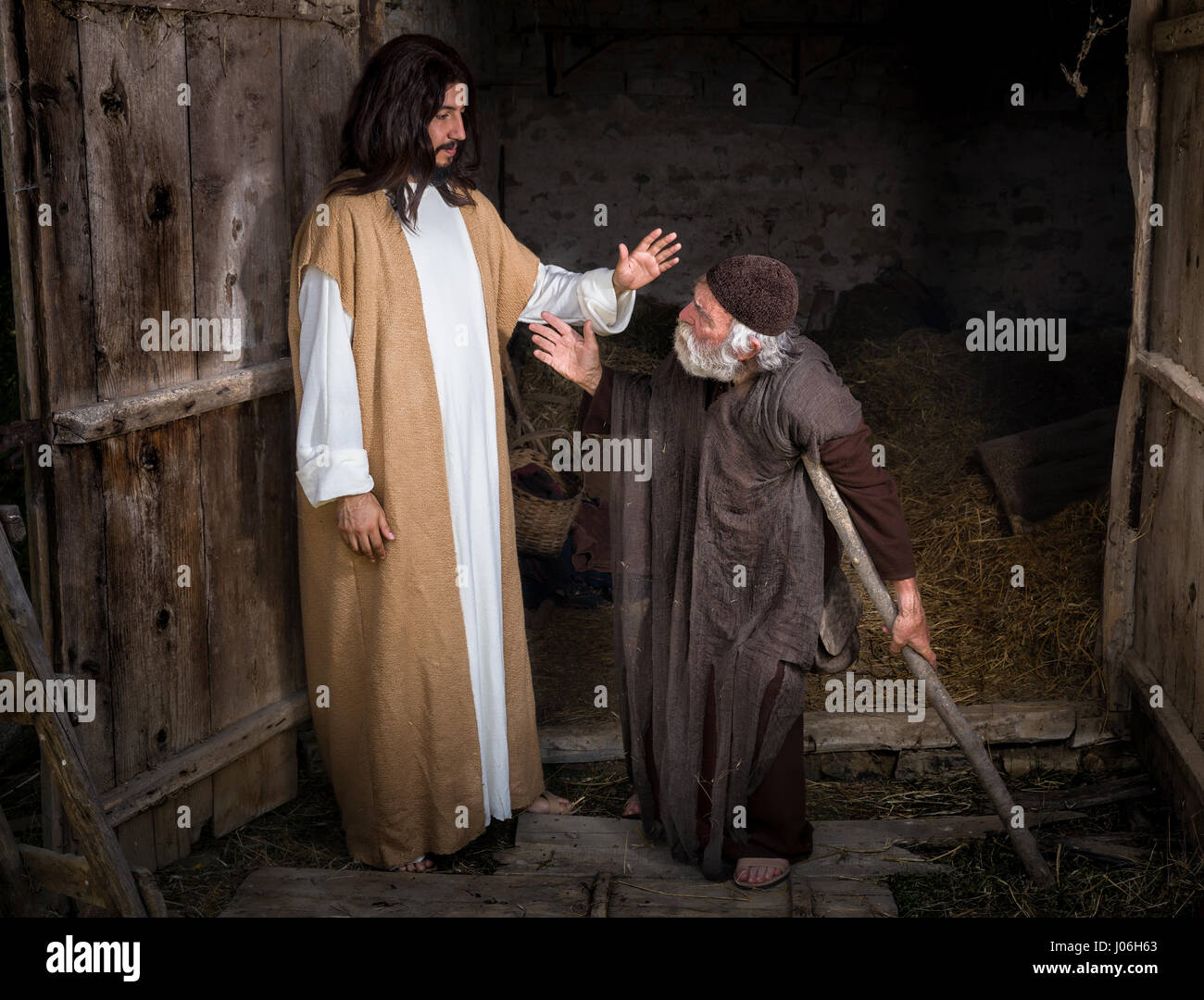Jesus healing the lame or crippled man Stock Photo - Alamy