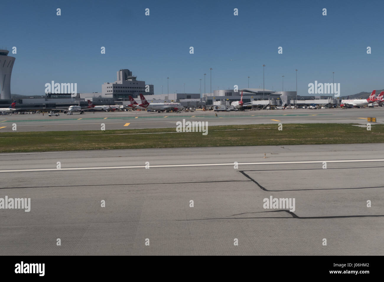 Virgin America planes at a jet bridge at SFO airport Stock Photo - Alamy