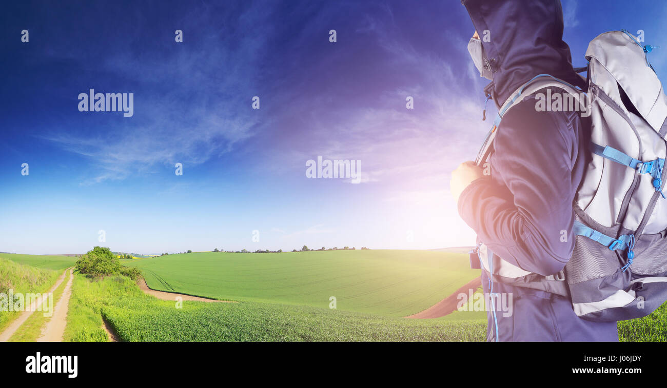 Tourist on natural background. Hiker with backpack on blue sky backdrop ...