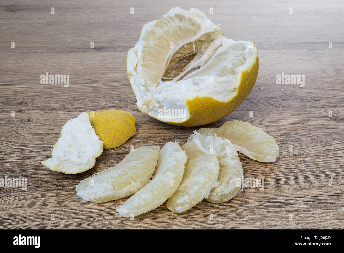pomelo opened slice from above Stock Photo - Alamy