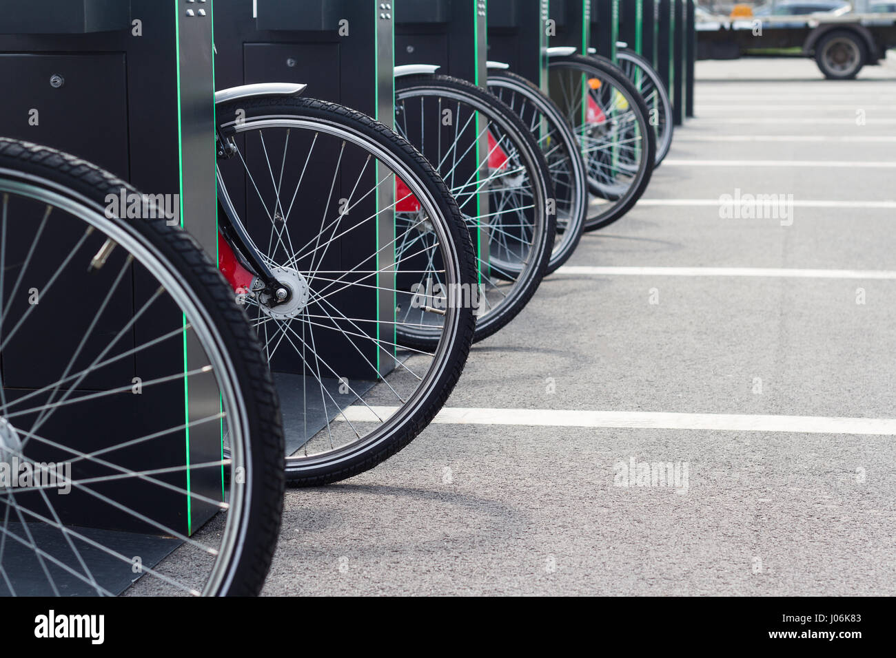 horizontal perspective view of city bike stand with row of bicycles for ...