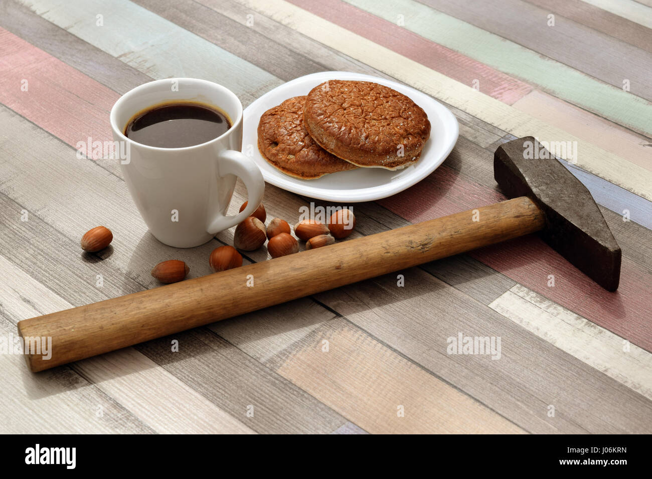 Coffee break with hammer Stock Photo - Alamy