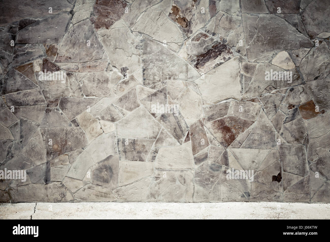 Rough gray outdoor stone wall, background photo texture Stock Photo - Alamy