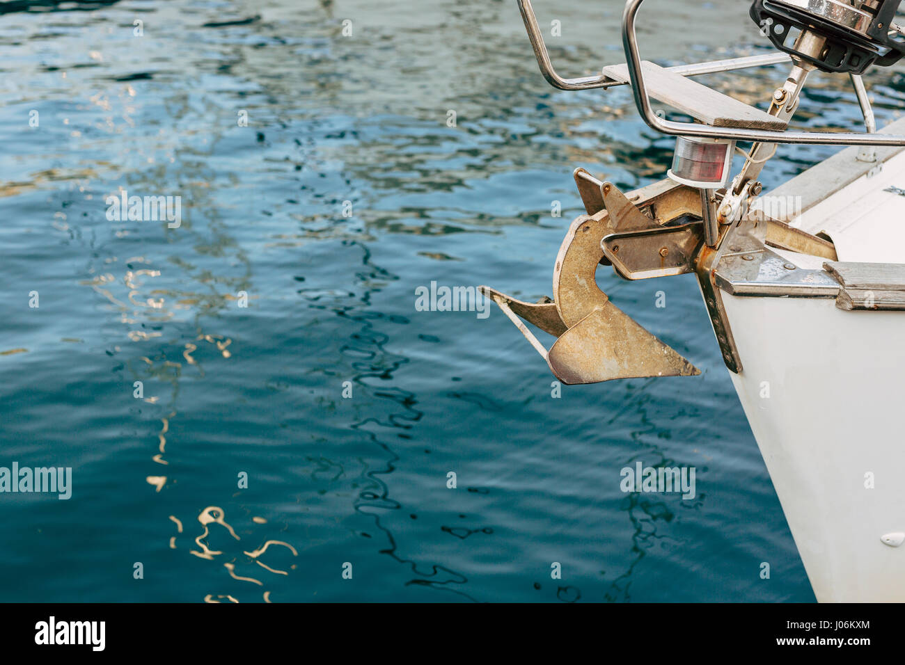 Large metal ship anchor. The ship in the sea Stock Photo - Alamy
