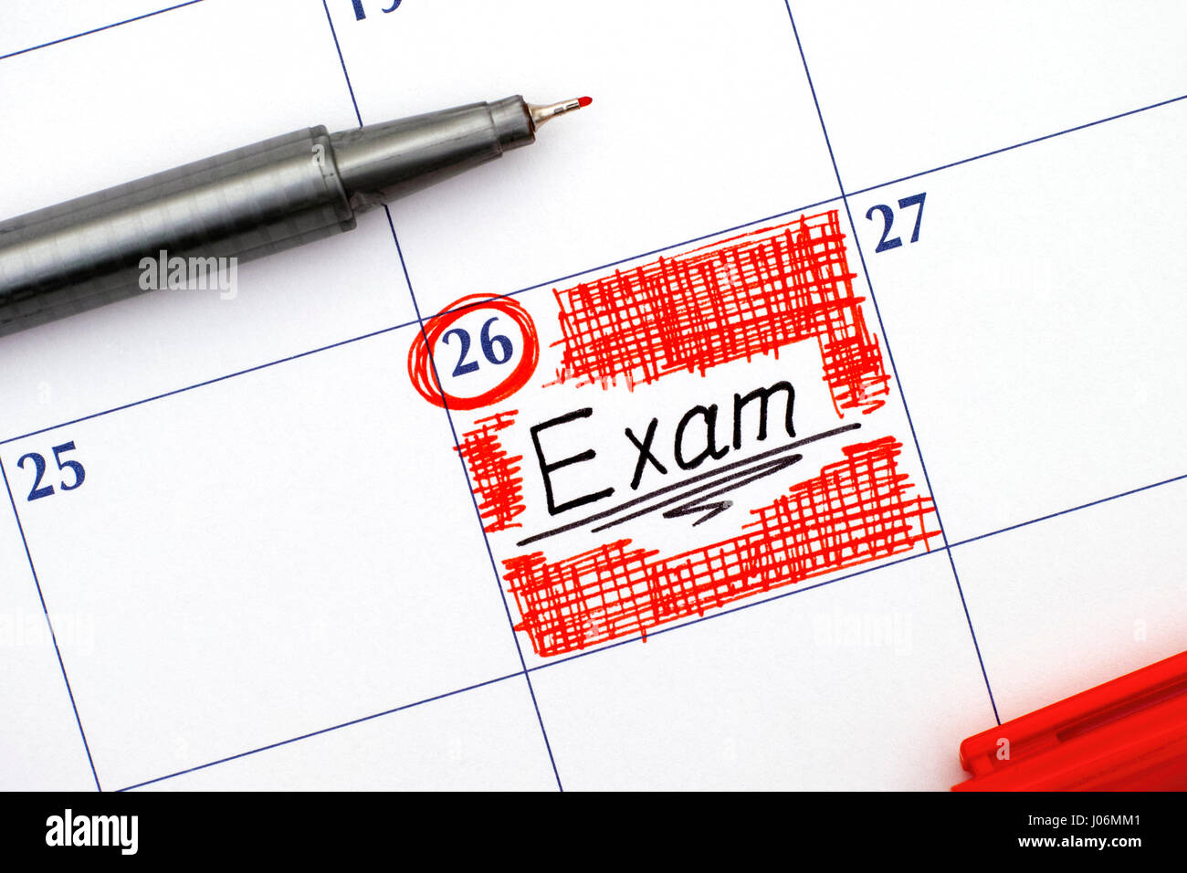 Reminder Exam in calendar with red pen Stock Photo - Alamy