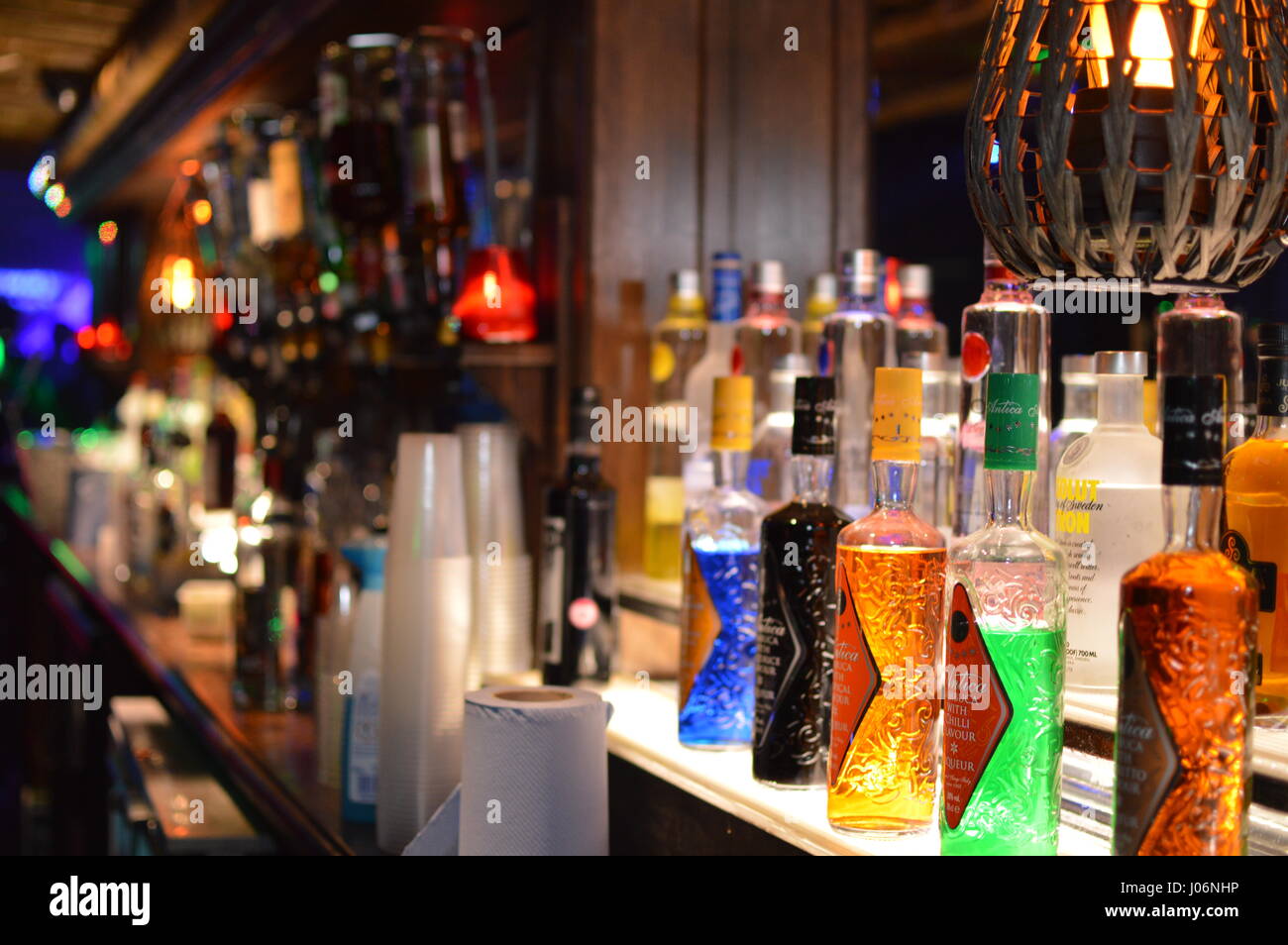 Selection of drinks behind the bar in a nightclub Stock Photo - Alamy