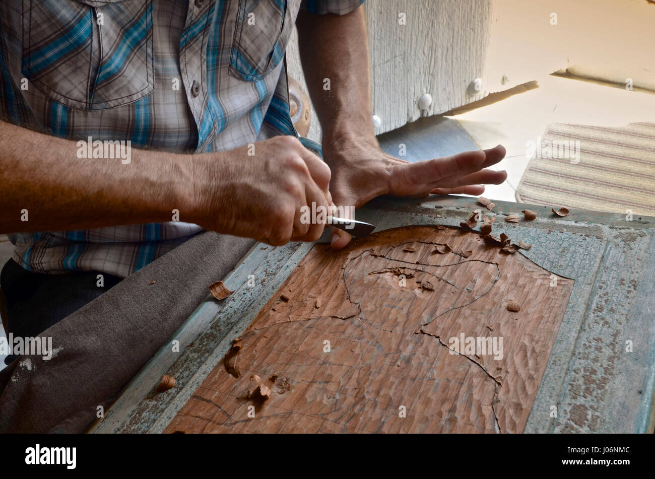Wood carver working Stock Photo - Alamy