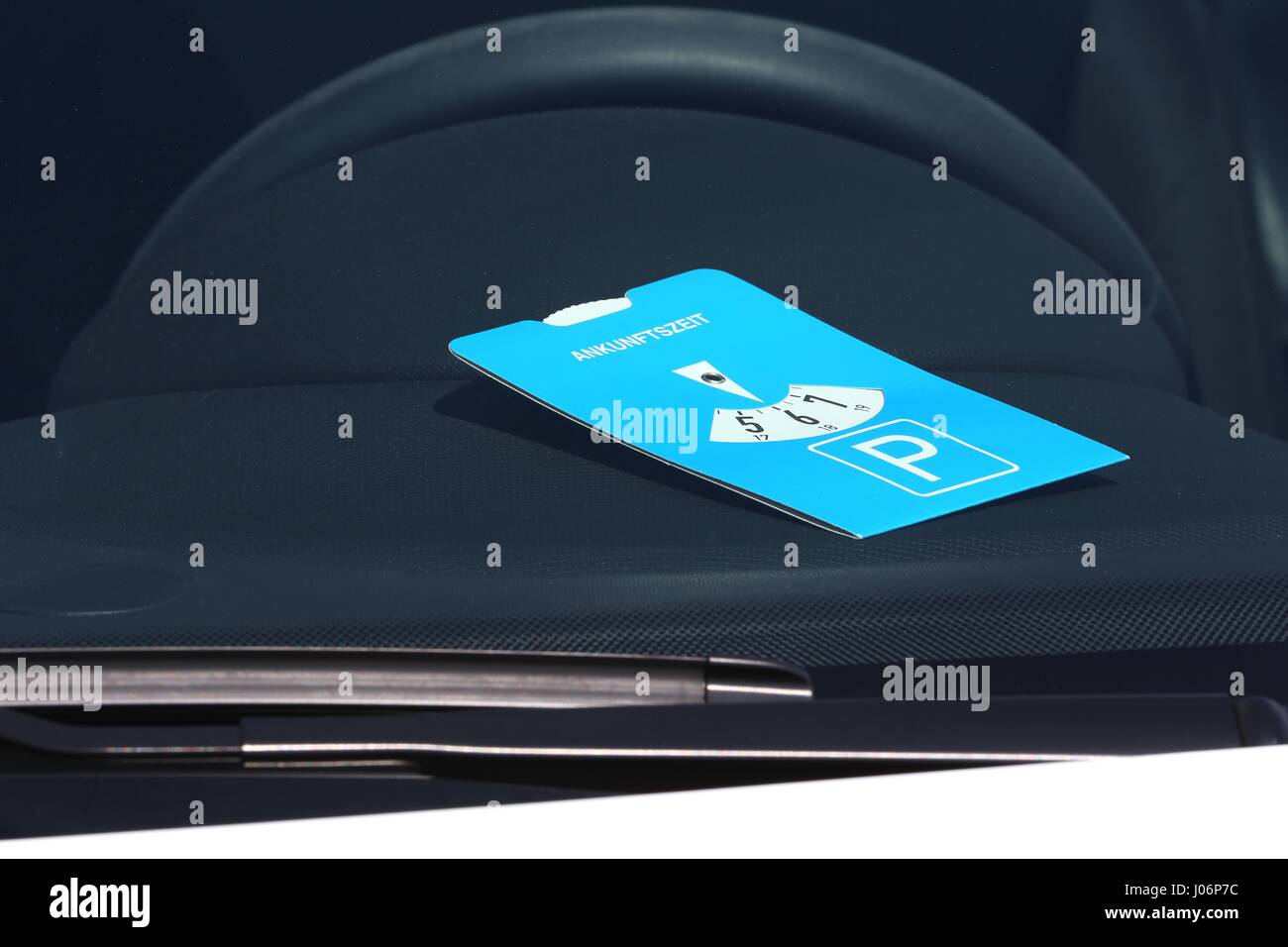 European standard parking disc on display behind front windshield Stock ...