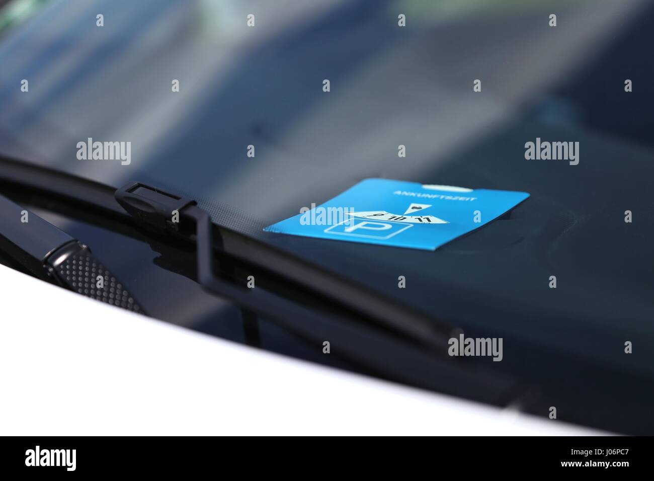 European standard parking disc on display behind front windshield Stock ...
