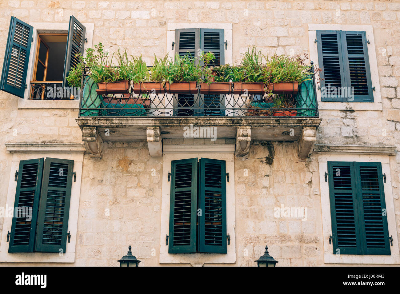 Forged balcony in an old house. Balkan architecture, Montenegro ...