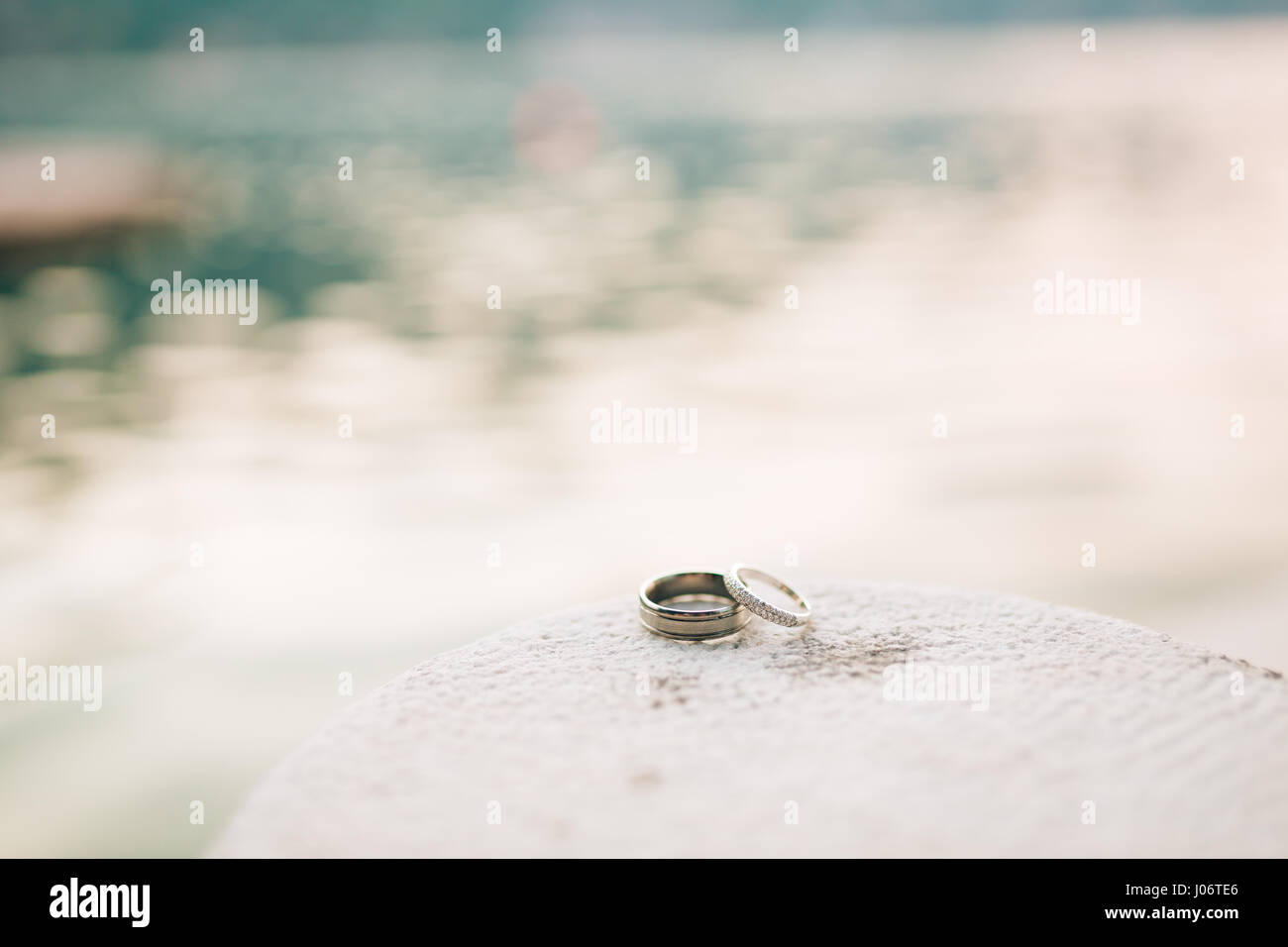 Wedding rings on the rocks near the sea Stock Photo - Alamy