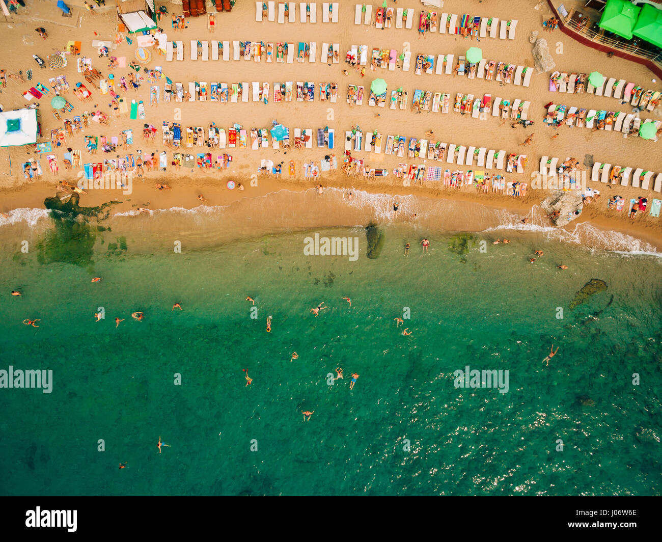 Top View of Beach. Aerial view of sandy beach with tourists swim Stock ...