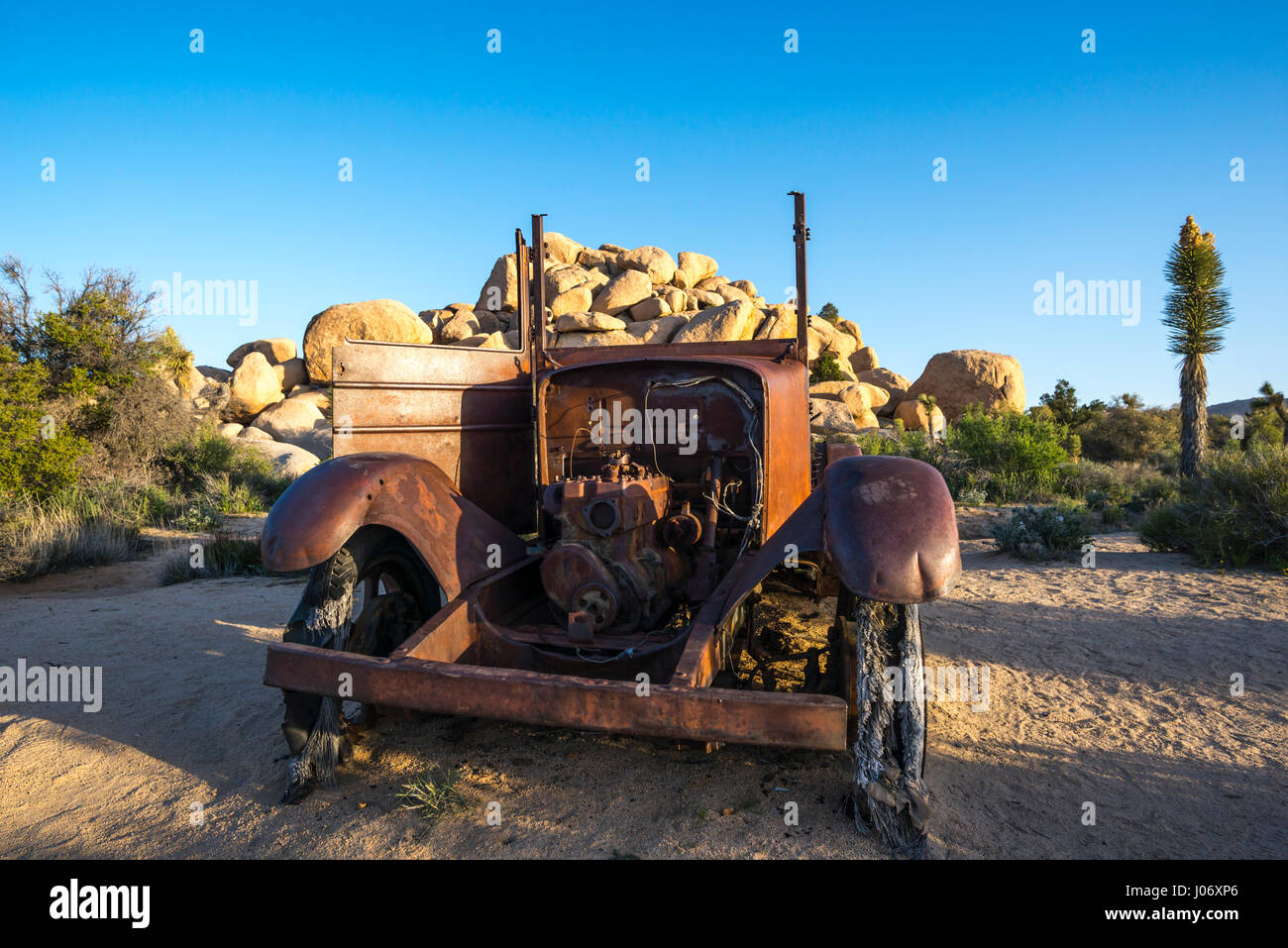 Rusted and abandoned car in the desert. Joshua Tree National Park ...