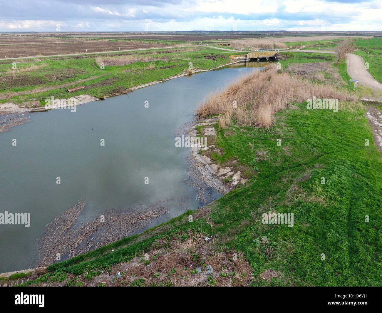 Bridges through irrigation canals. Rice field irrigation system Stock ...