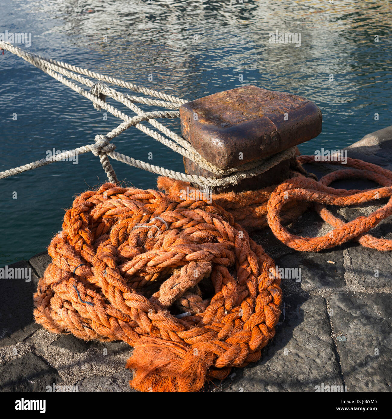 Ropes tied to a mooring bollard, Ischia Island, Campania, Italy Stock ...