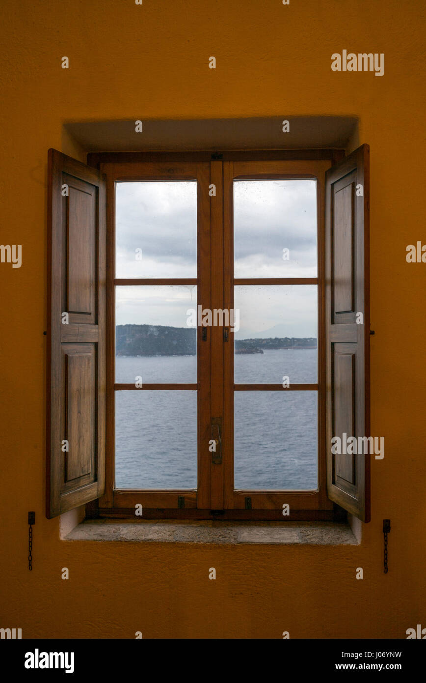Scenic view of sea seen through window, Aragonese Castle, Ischia Island ...