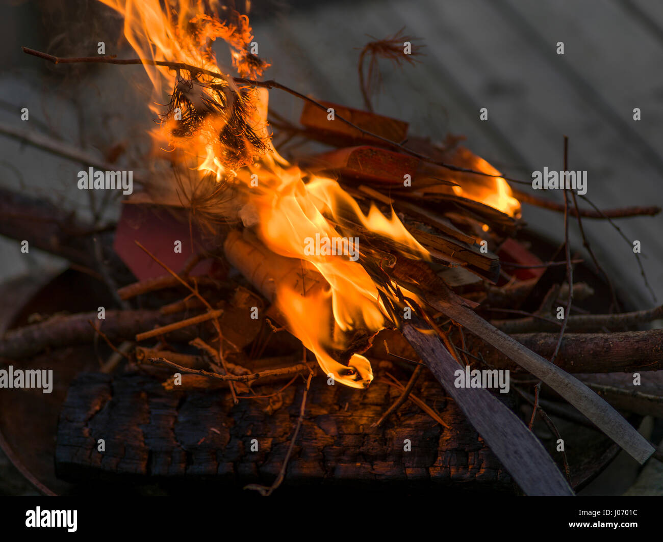 Campfire on dock, Lake of The Woods, Ontario, Canada Stock Photo - Alamy