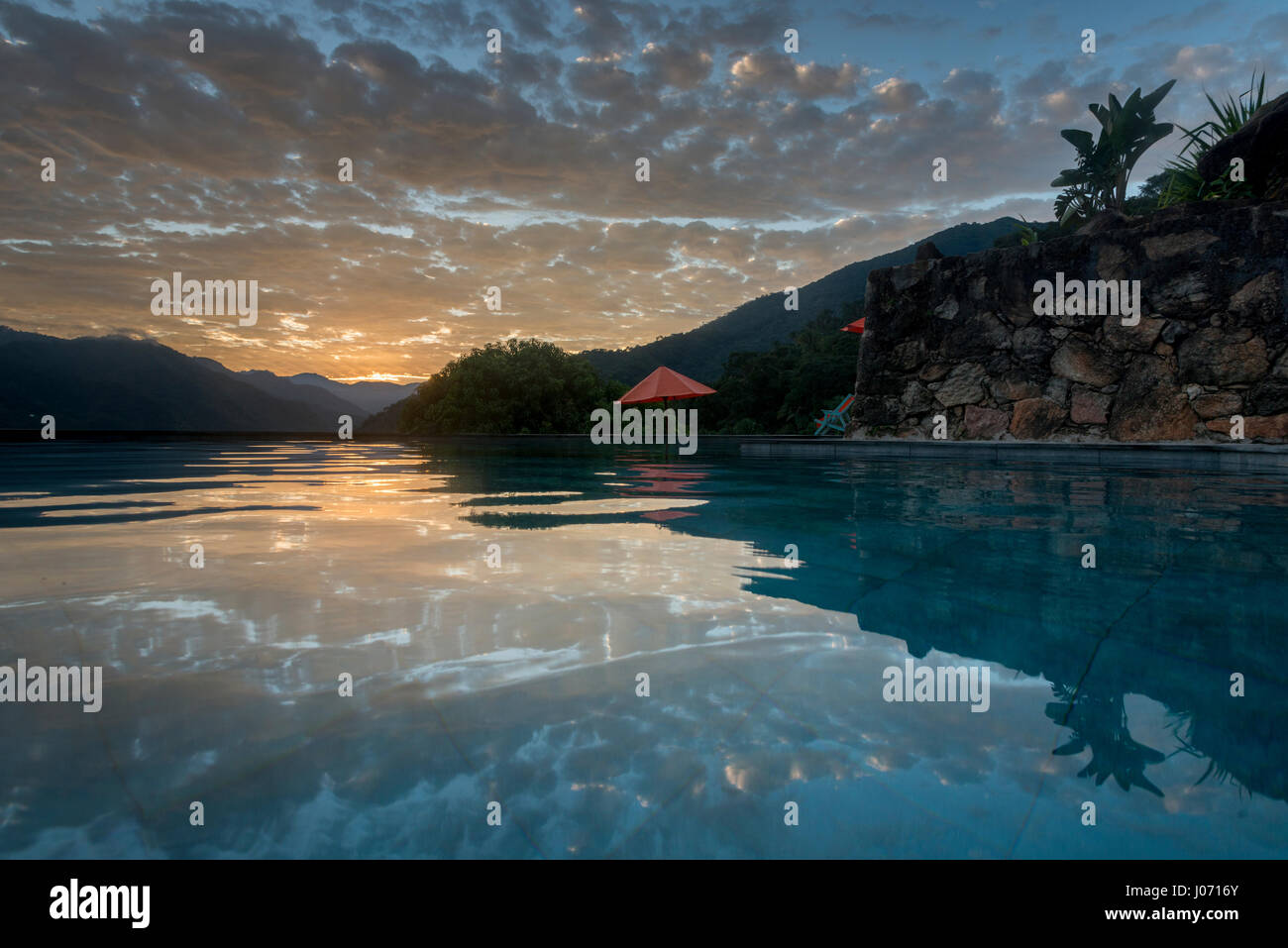 Infinity pool in tourist resort near mountains, Yelapa, Jalisco, Mexico ...
