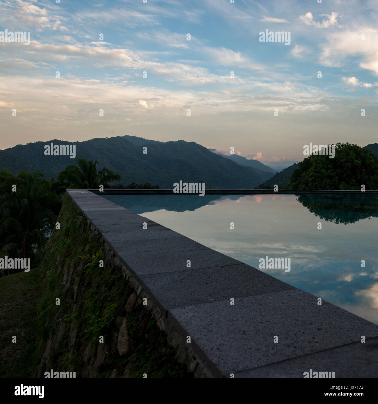 Infinity pool in tourist resort near mountains, Yelapa, Jalisco, Mexico ...