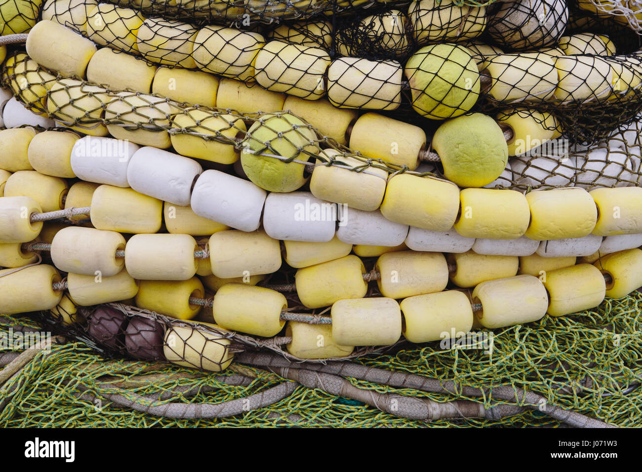 Pile Of Yellow Fishing Nets And Rope High Resolution Stock Photography ...