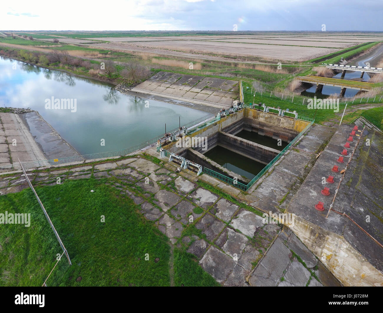 Water pumping station of irrigation system of rice fields. View from ...
