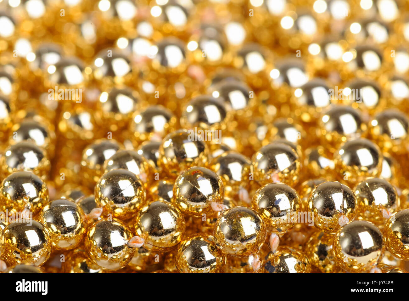 Many golden balls in horizontal composition Stock Photo - Alamy