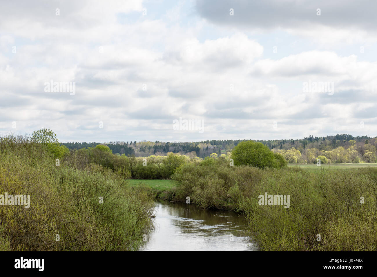 countryside fields in early spring with clouds and farmland Stock Photo ...