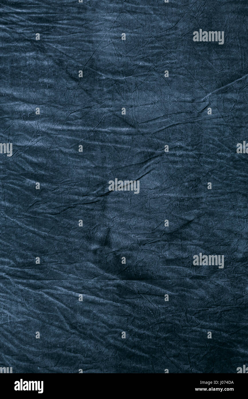 Texture of dark blue crumpled cotton, abstract textile background with ...