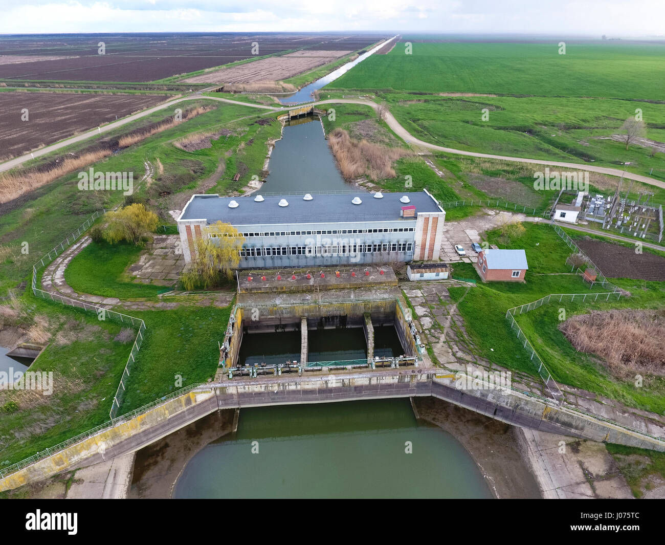 Water pumping station of irrigation system of rice fields. View from ...