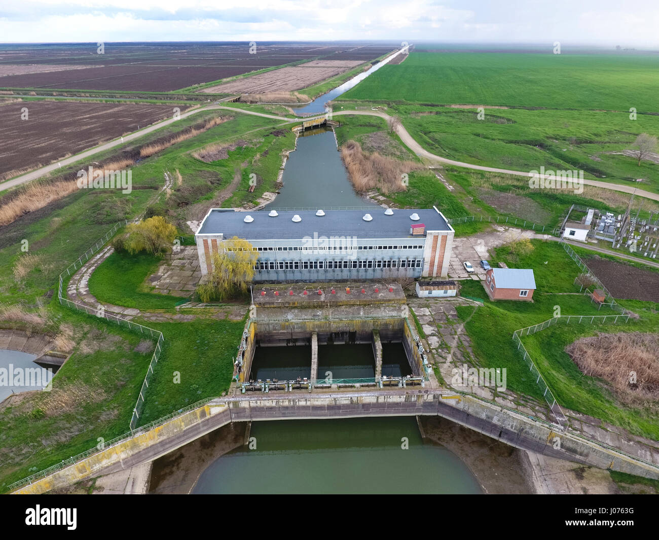 Water pumping station of irrigation system of rice fields. View from ...