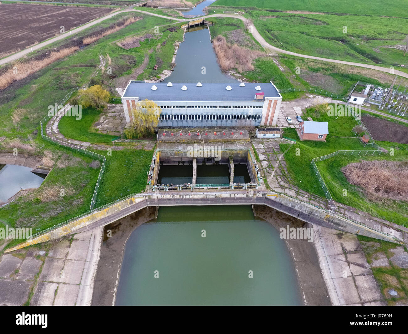 Water pumping station of irrigation system of rice fields. View from ...