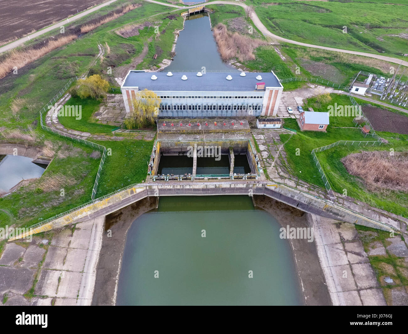 Water pumping station of irrigation system of rice fields. View from ...