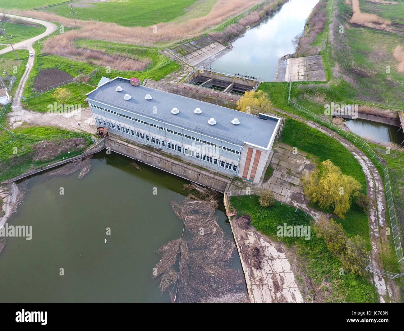 Water pumping station of irrigation system of rice fields. View from ...
