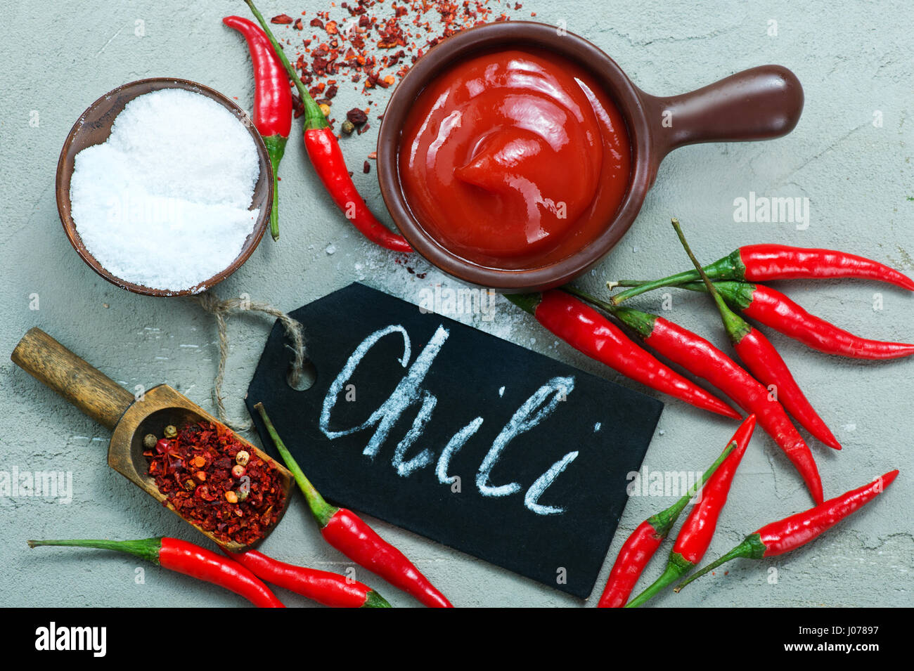 chilli sauce and aroma spice on a table Stock Photo - Alamy
