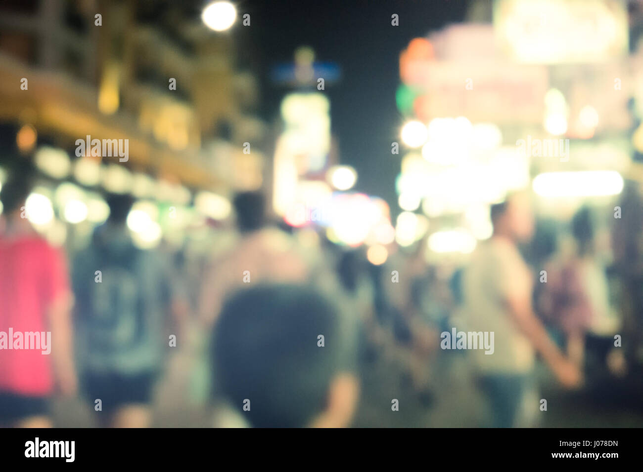 Blurred image of busy night life in the city Stock Photo - Alamy