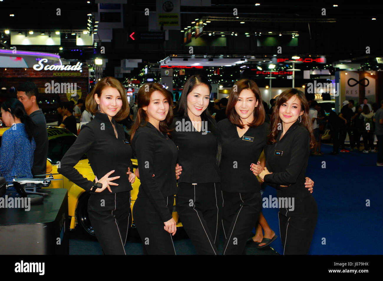 BANGKOK, THAILAND - APRIL 09, 2017: Unidentified female presenter pose ...