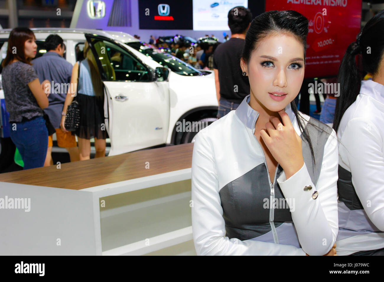 BANGKOK, THAILAND - APRIL 09, 2017: Unidentified female presenter pose ...